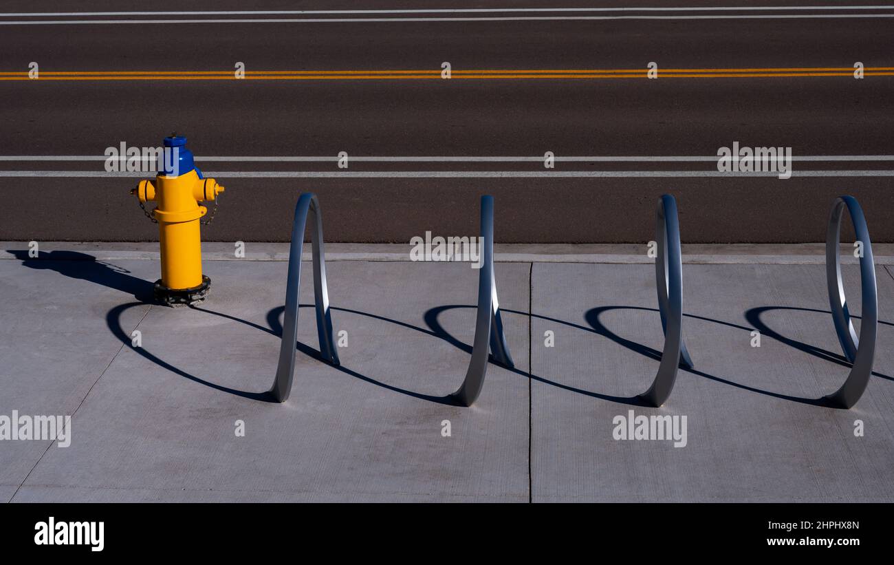 Fire Hydrant and Bicycle locking device at curb side Stock Photo - Alamy