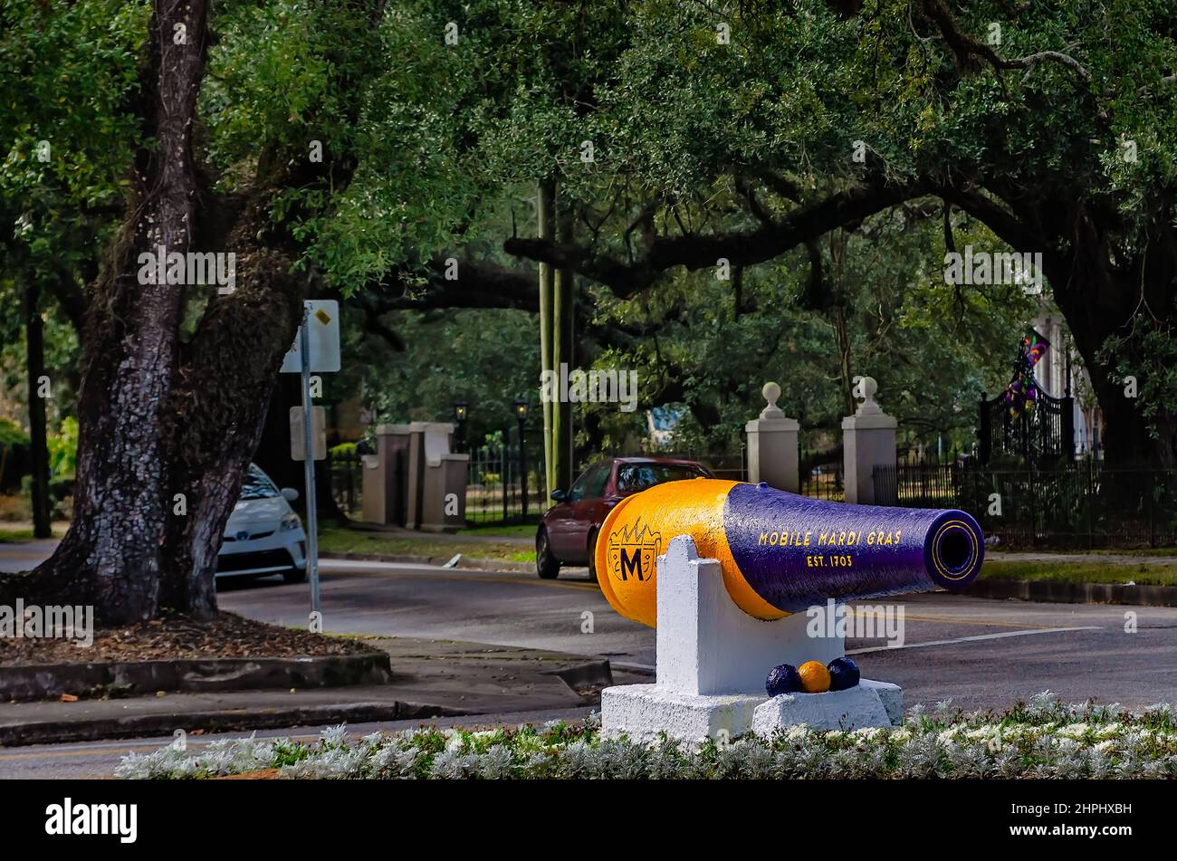 A Civil War cannon is painted for Mardi Gras on Government Street, Feb ...