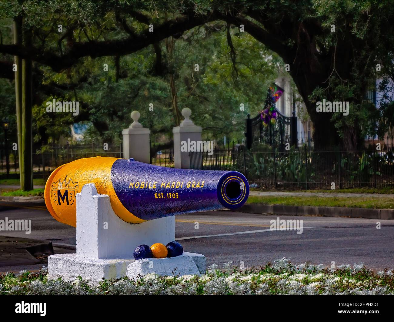 A Civil War cannon is painted for Mardi Gras on Government Street, Feb ...