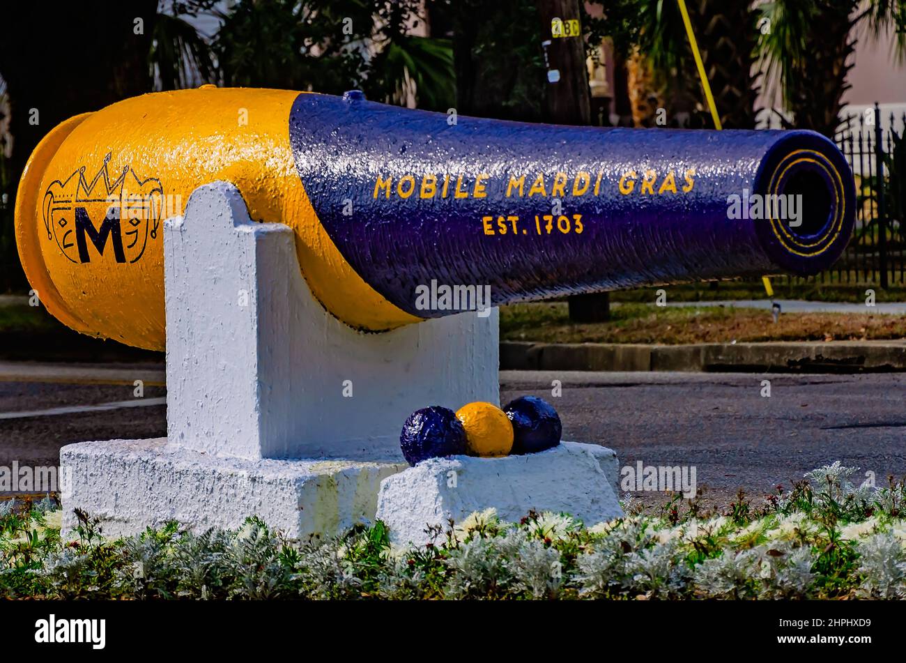 A Civil War cannon is painted for Mardi Gras on Government Street, Feb ...