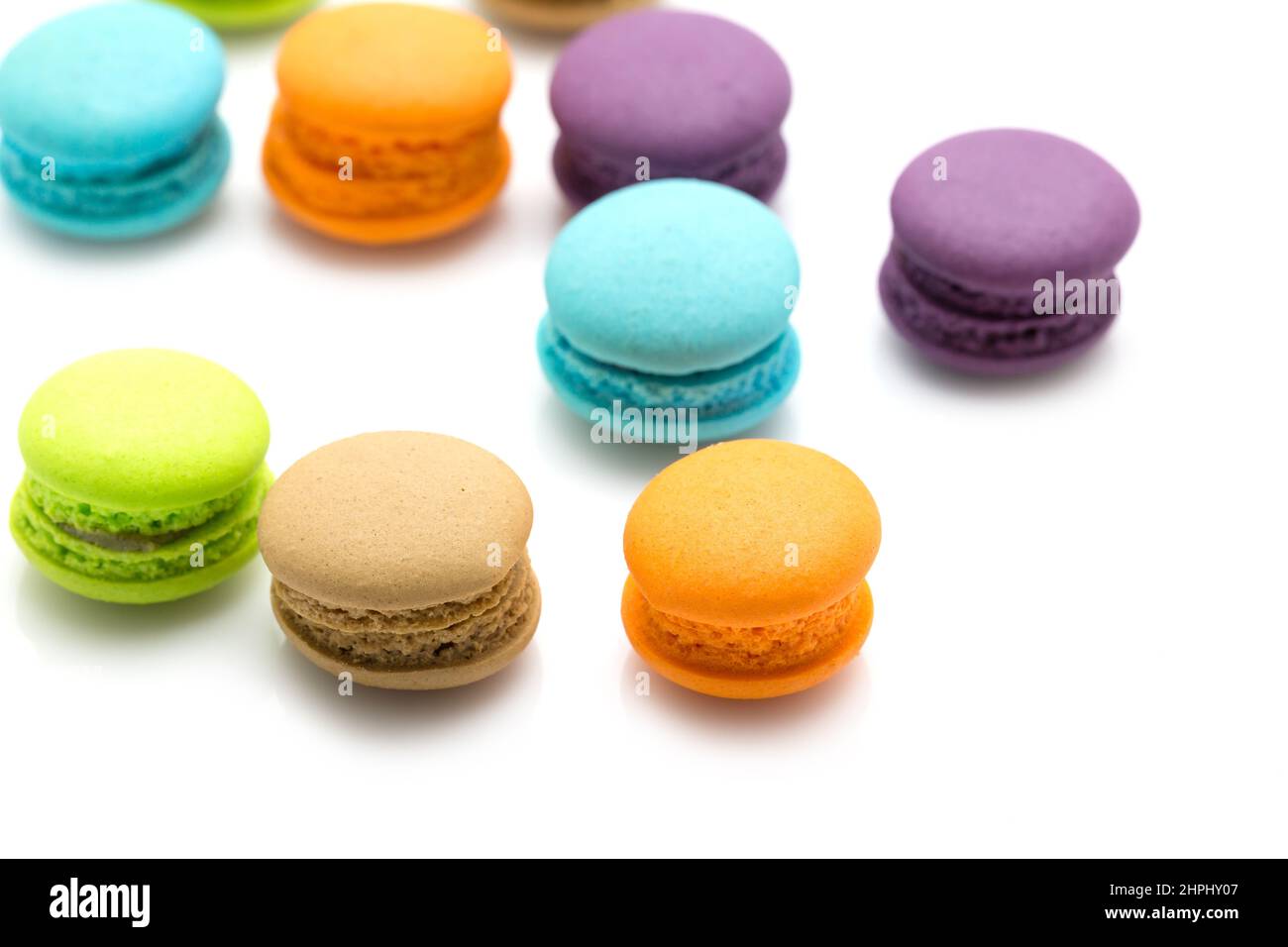 Sweet colourful macaroons isolated on white background Stock Photo - Alamy