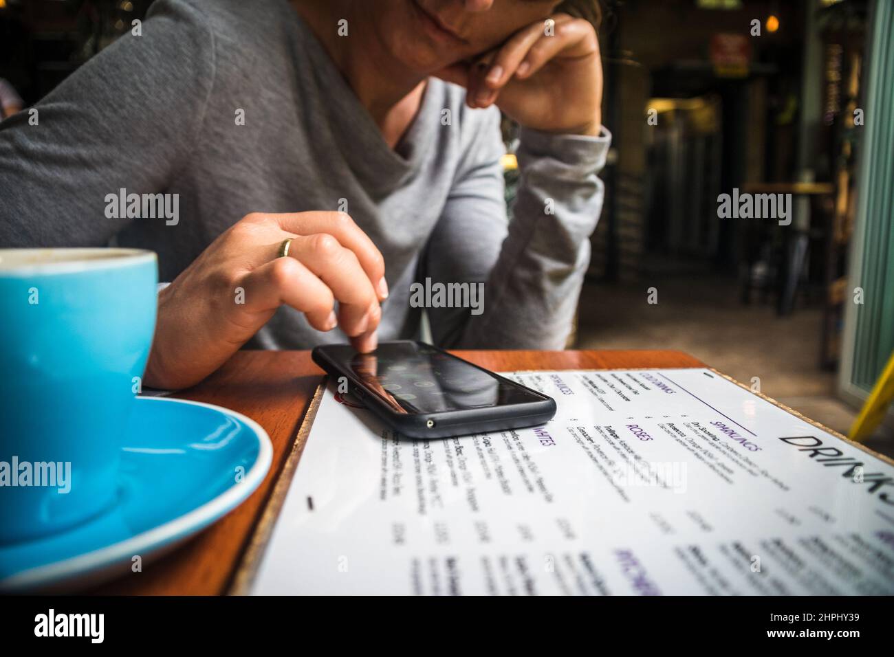 Person using mobile phone australia hi-res stock photography and images ...