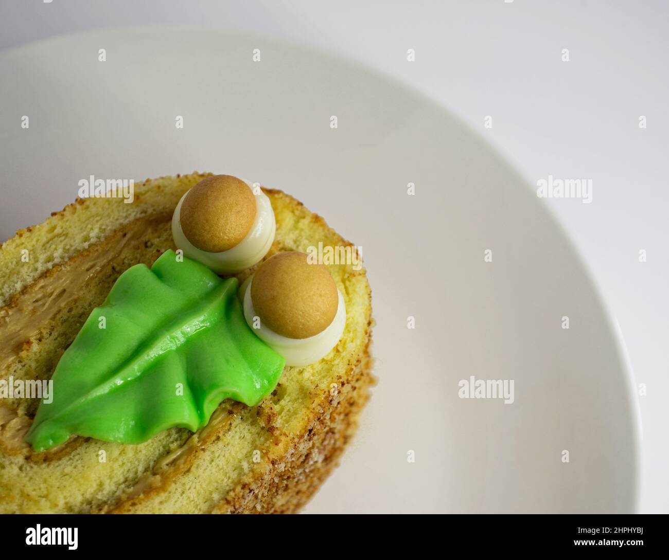 Stump cake Swiss roll pastry Stock Photo - Alamy