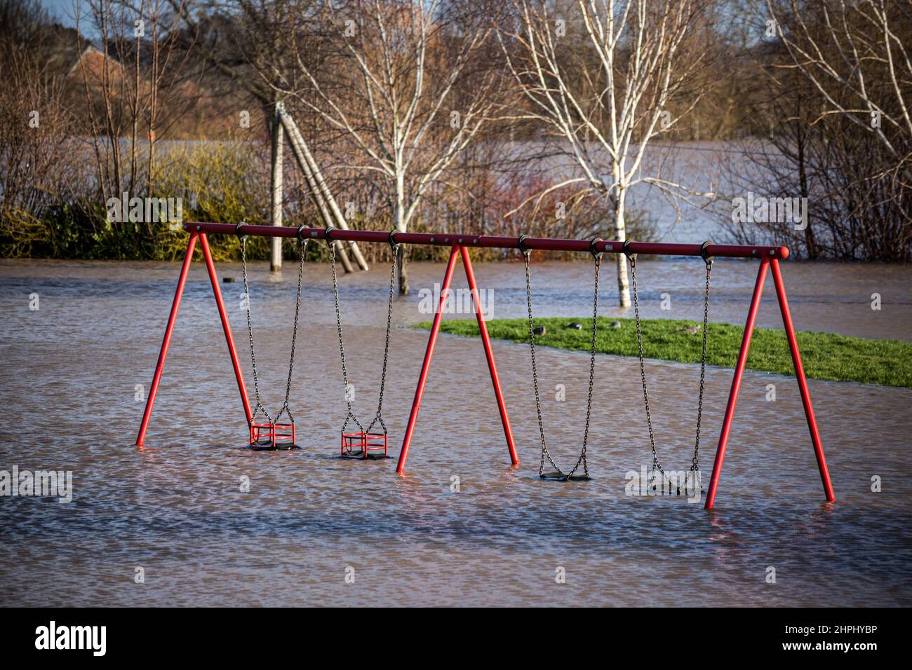 Swings are submerged by the flooded river Wye as Storm Franklin brings ...