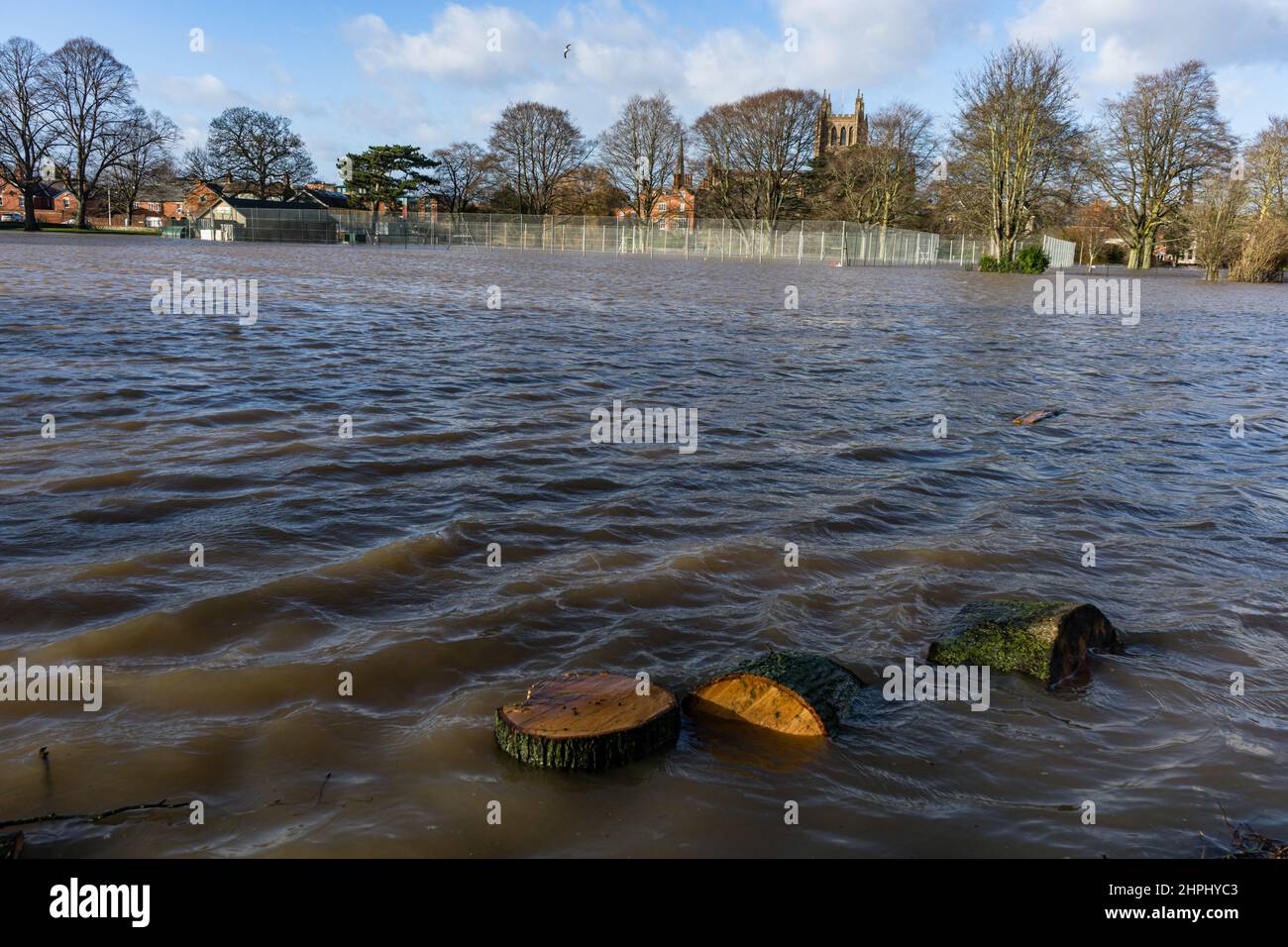Logs float in the flood water on the banks of the River Wye as Storm ...