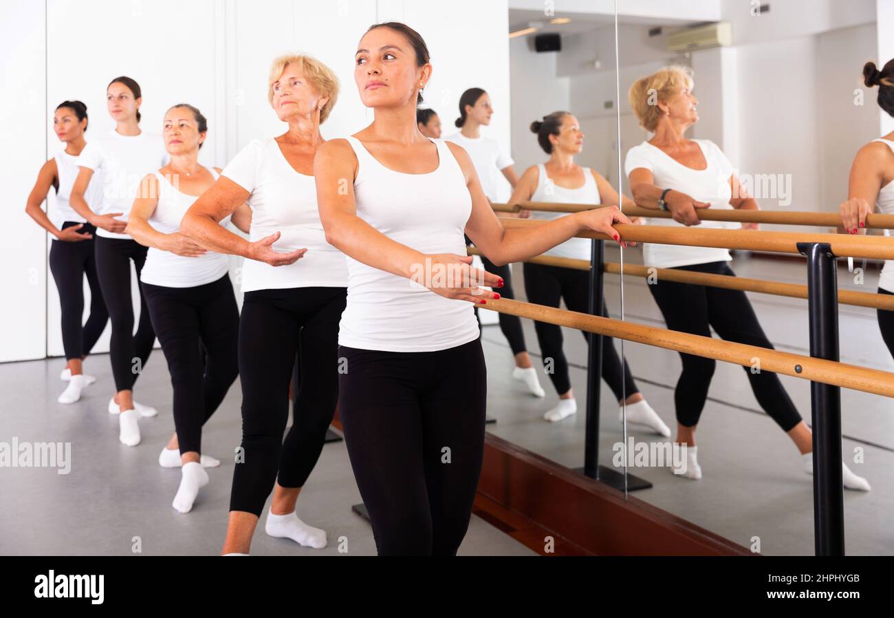 Group of women doing ballet dance moves Stock Photo - Alamy