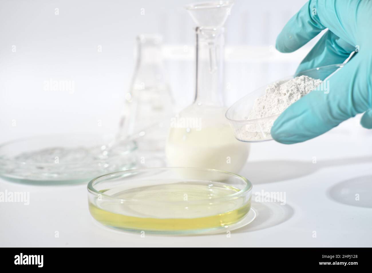 medical laboratory research, petri dish with growth medium and powder ...