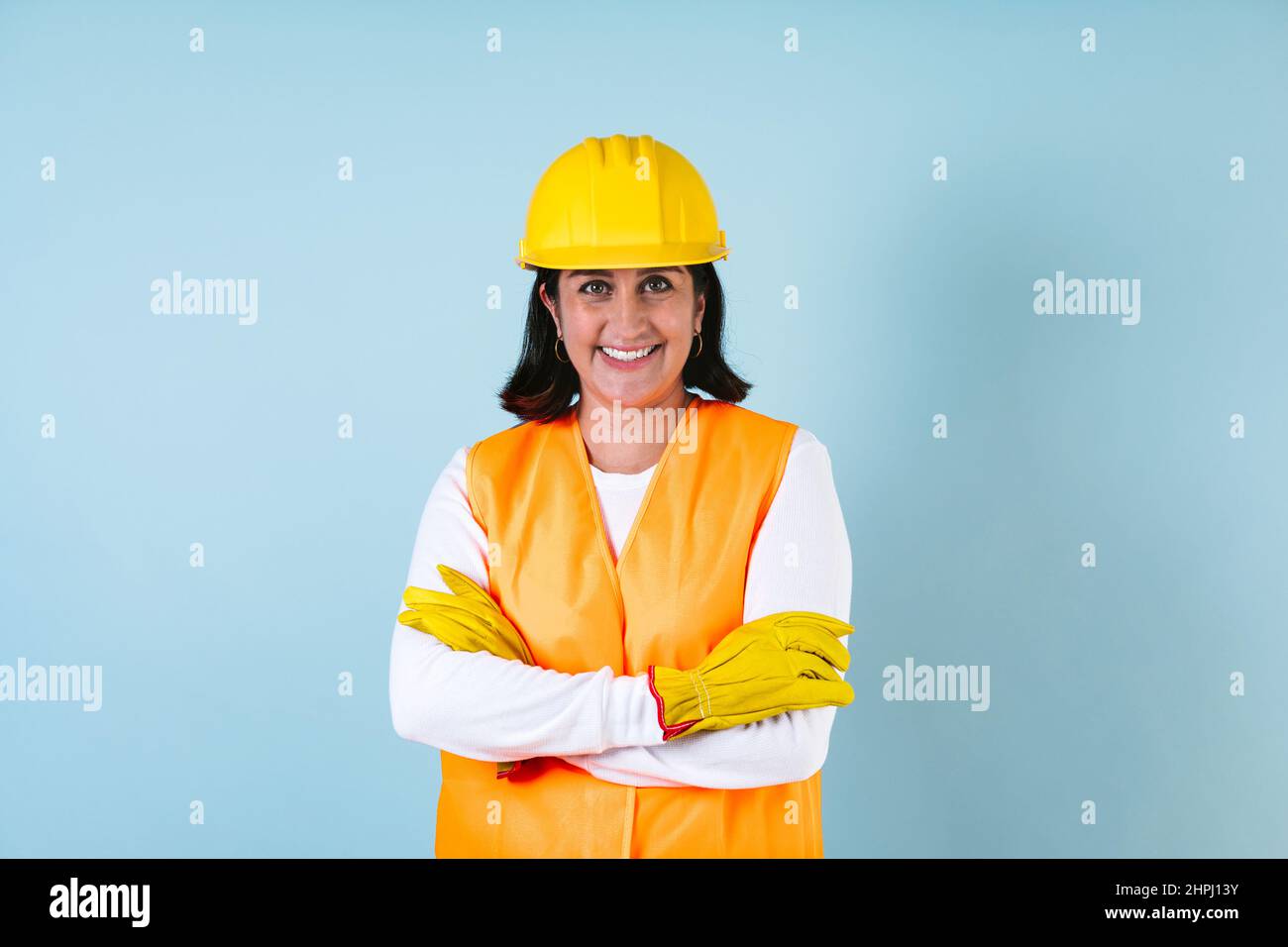 Hispanic woman Professional engineering and worker with helmet in ...