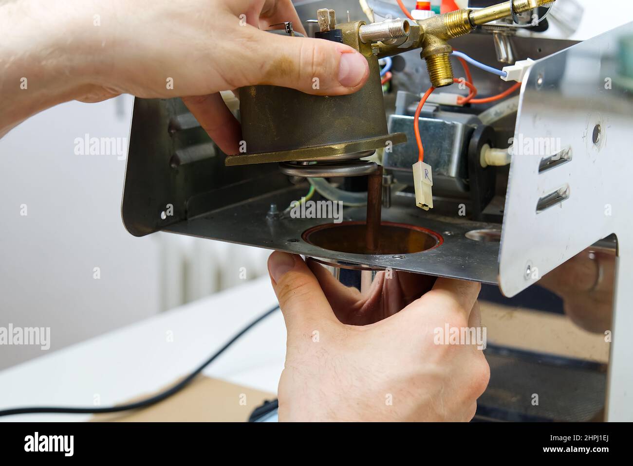 Repairs the coffee machine hi-res stock photography and images - Alamy
