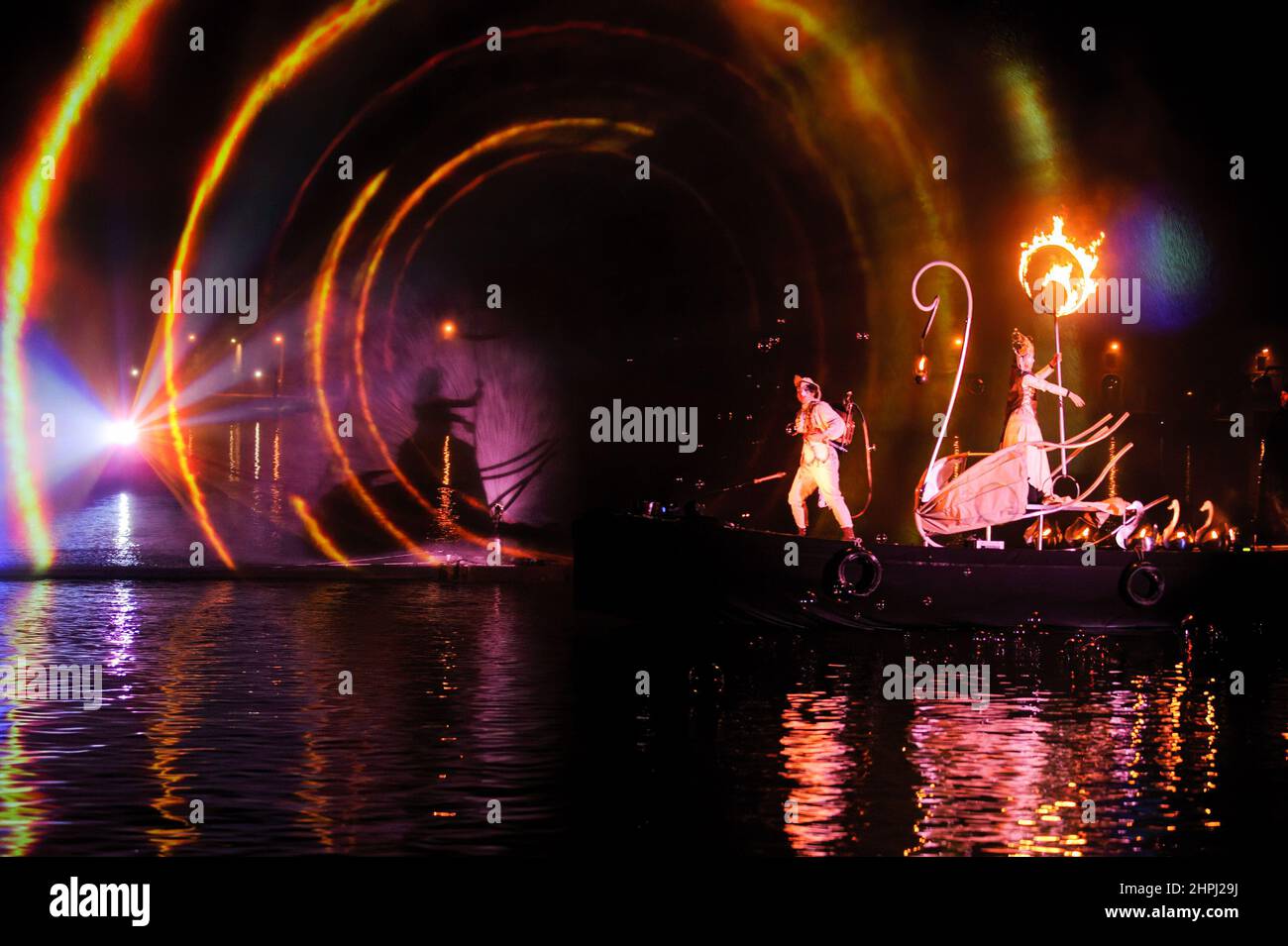 Venice, Italy, Italy. 19th Feb, 2022. Performers and a woman's shadow ...