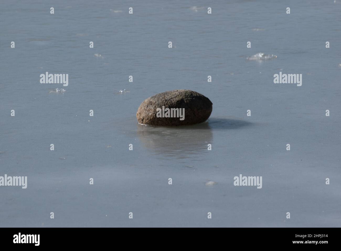 Closeup of a frozen lake in winter Stock Photo - Alamy
