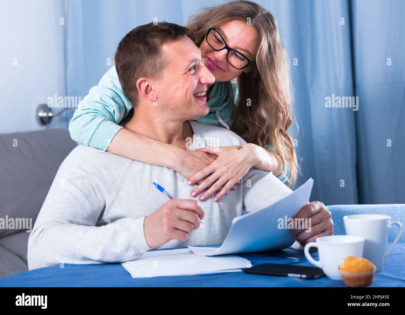 Middle aged people signing papers hi-res stock photography and images ...