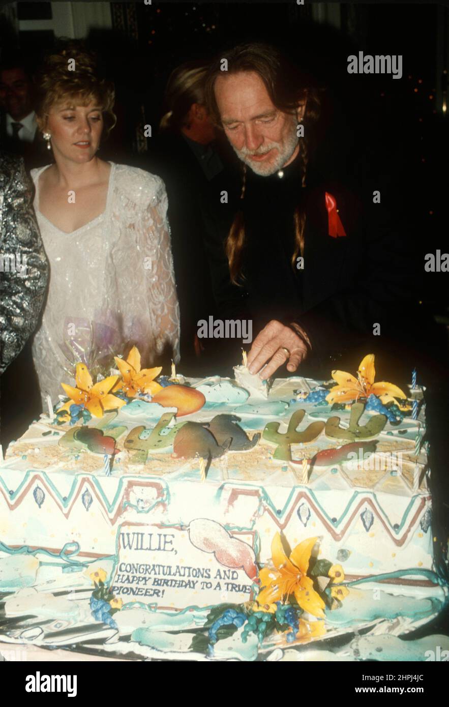 Willie Nelson candids being presented with a Birthday Cake in 1992 ...