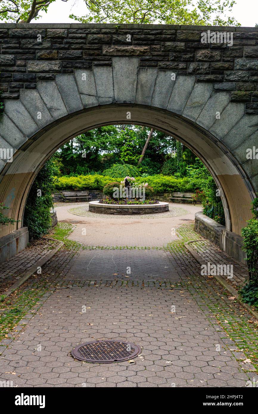 Beautiful design of an arch gate on tiled floor of Carl Schurz Park ...