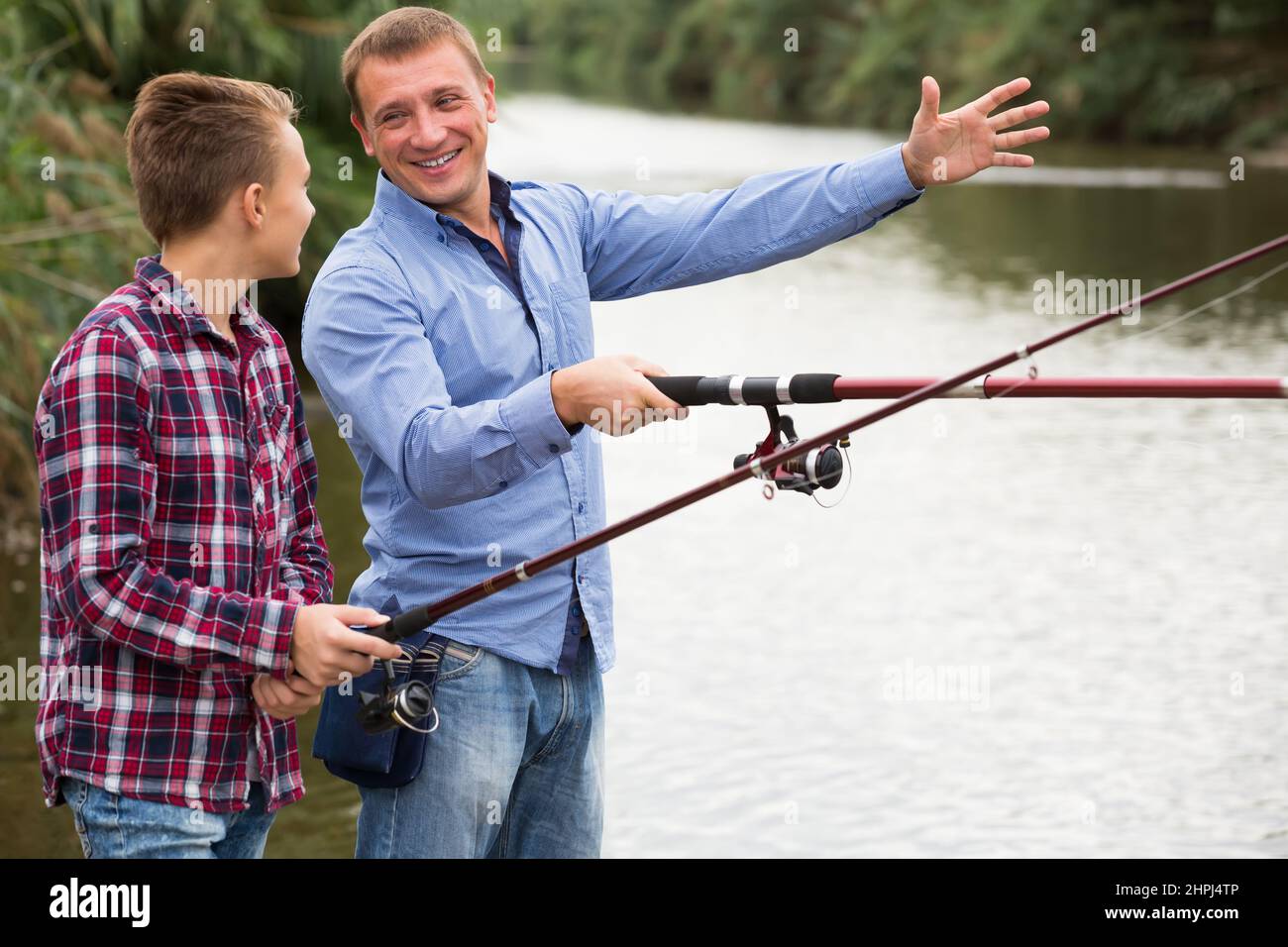 Boy with fishing tackle hi-res stock photography and images - Alamy