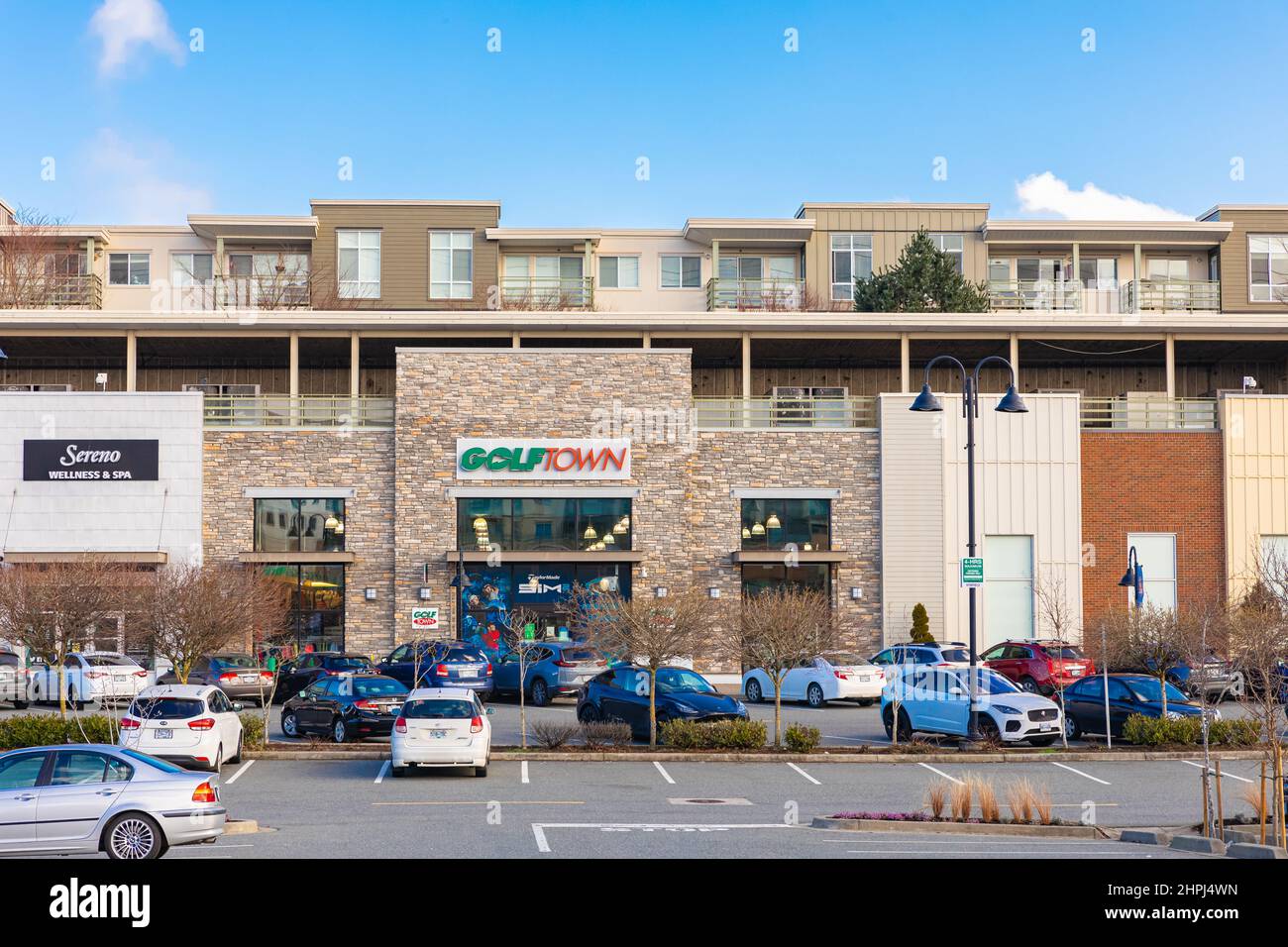 Exterior view of parking lots in modern shopping center in BC, Canada ...