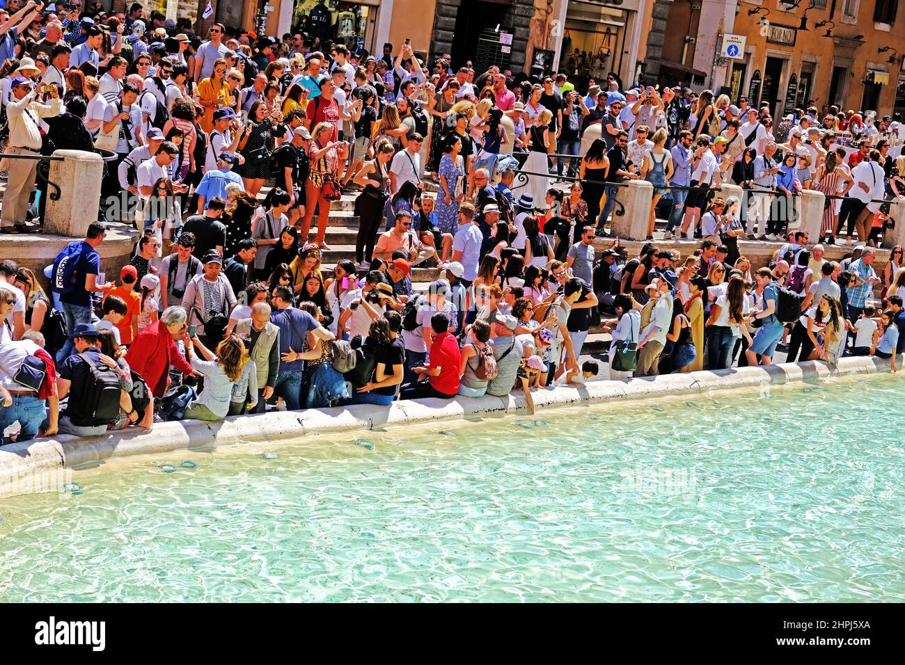 Tourists gathering around the Trevi Fountain in Rome Italy Stock Photo ...