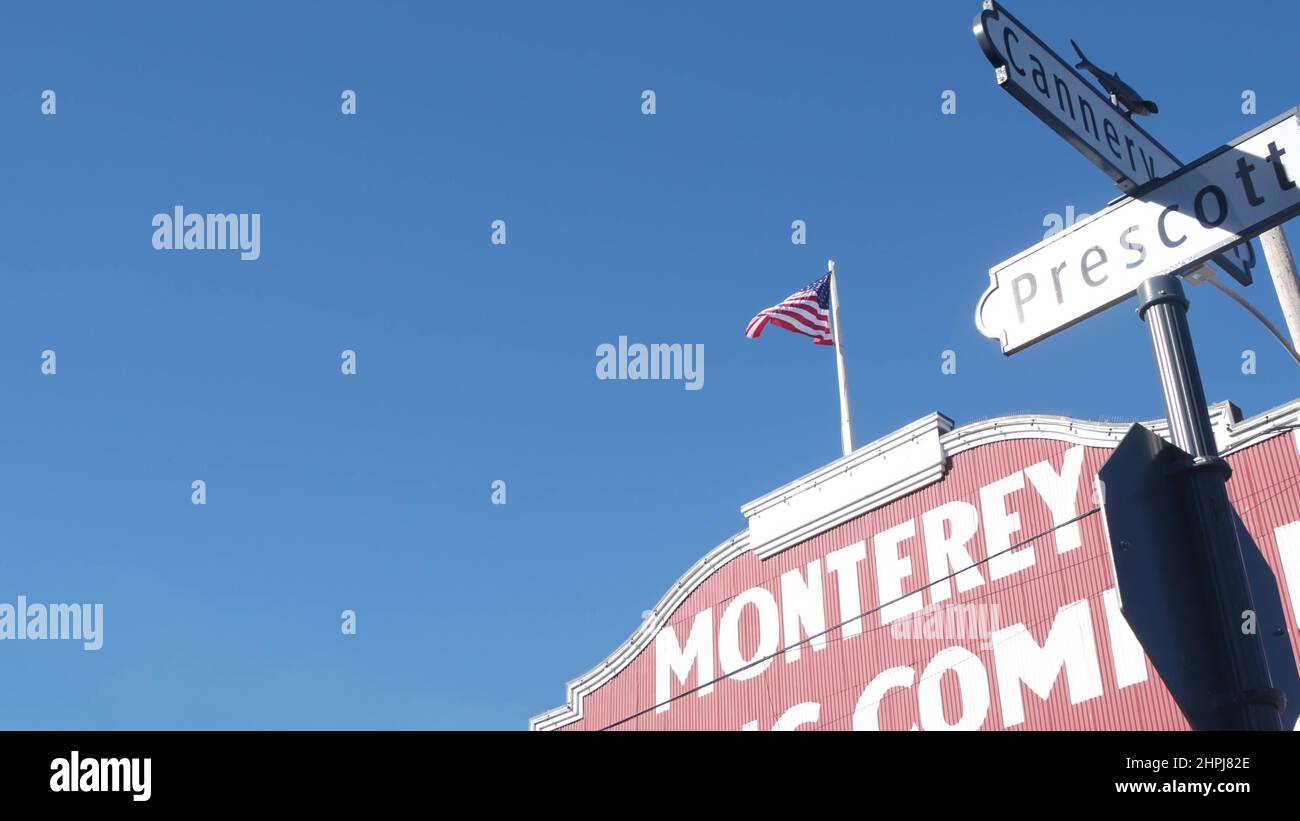 Red building, Cannery Row road sign, Monterey city, California tourist ...