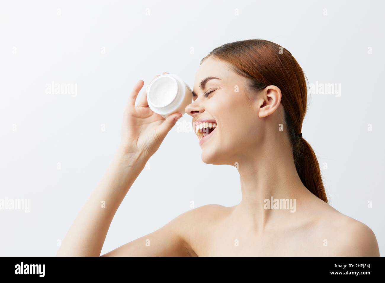 beautiful woman body cream posing clean skin care attractive look light ...