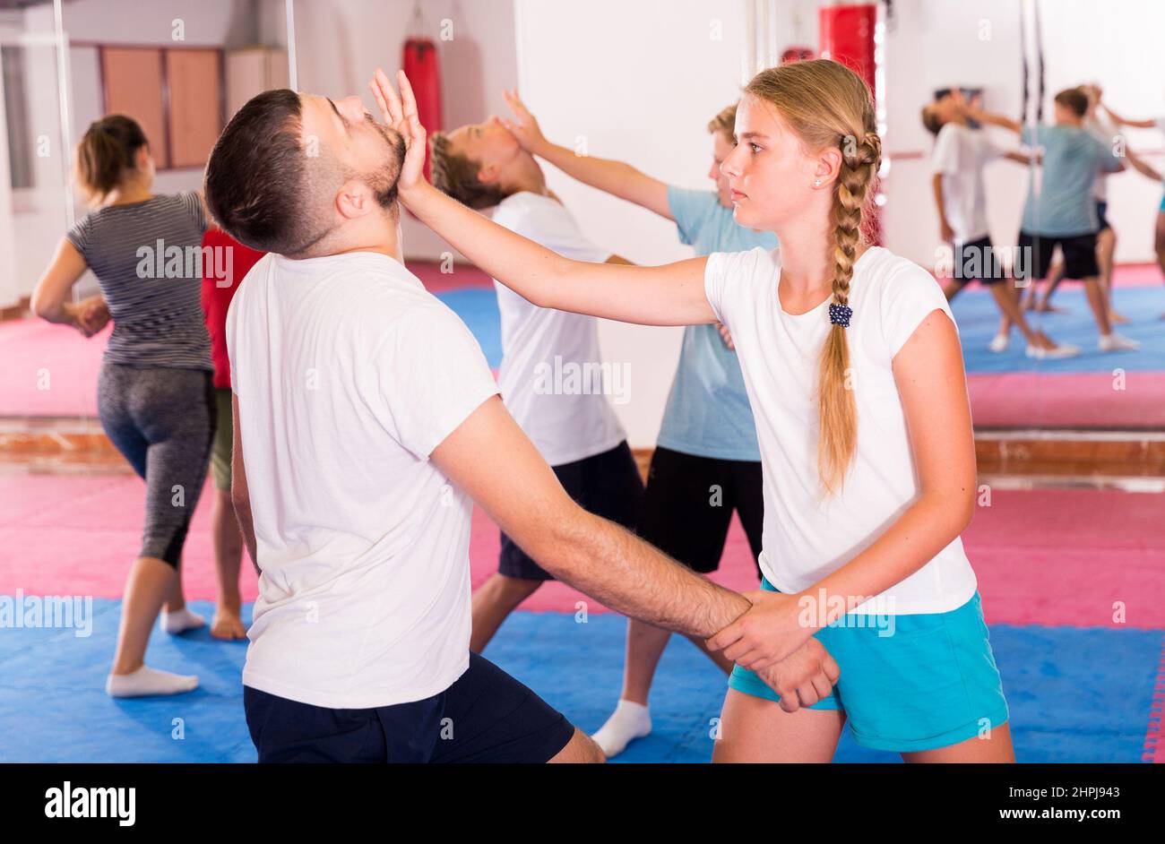 Kids exercising self-defense movements Stock Photo - Alamy