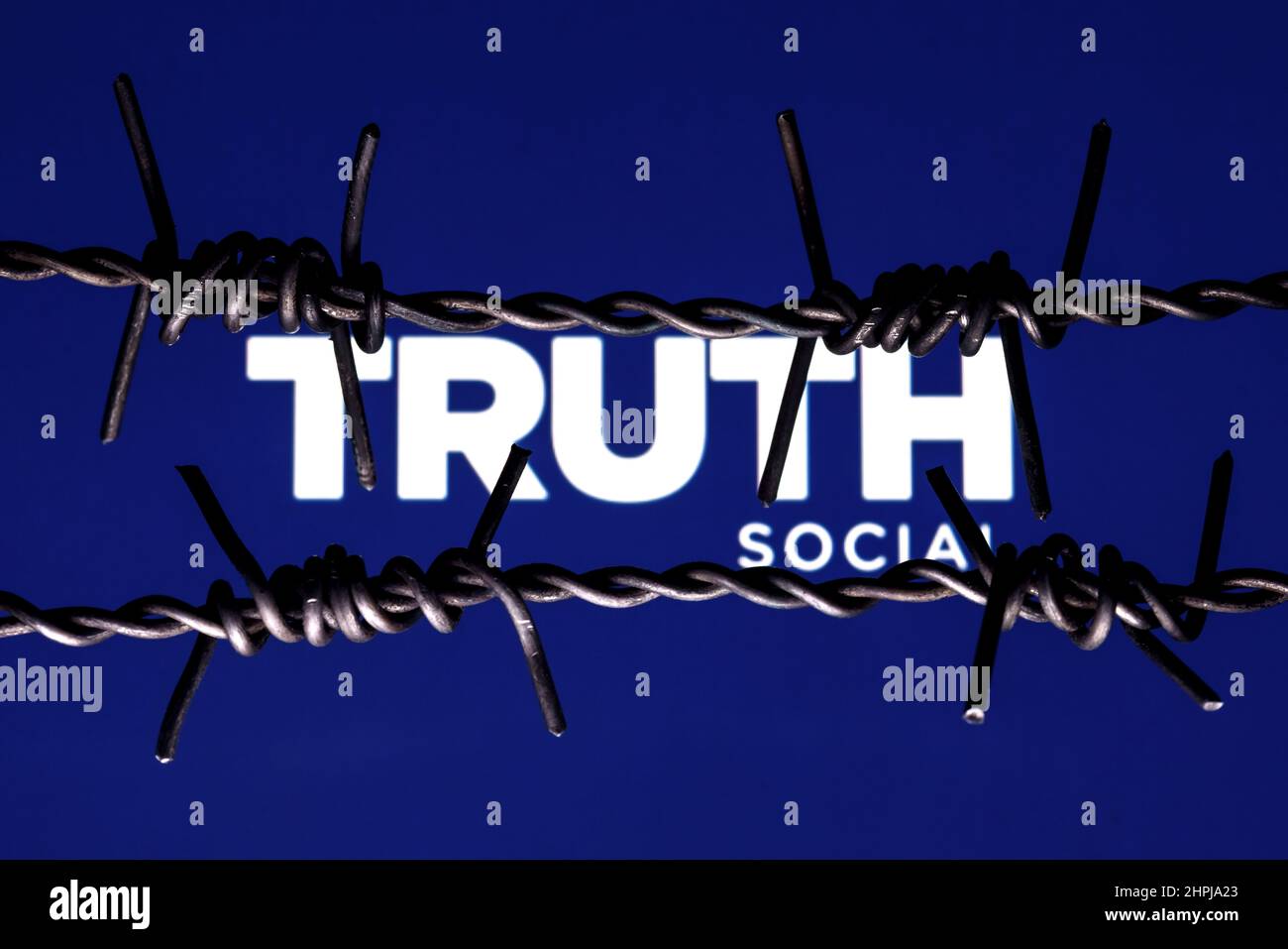 Truth Social network logo behind barbed wire. The concept of Truth ...