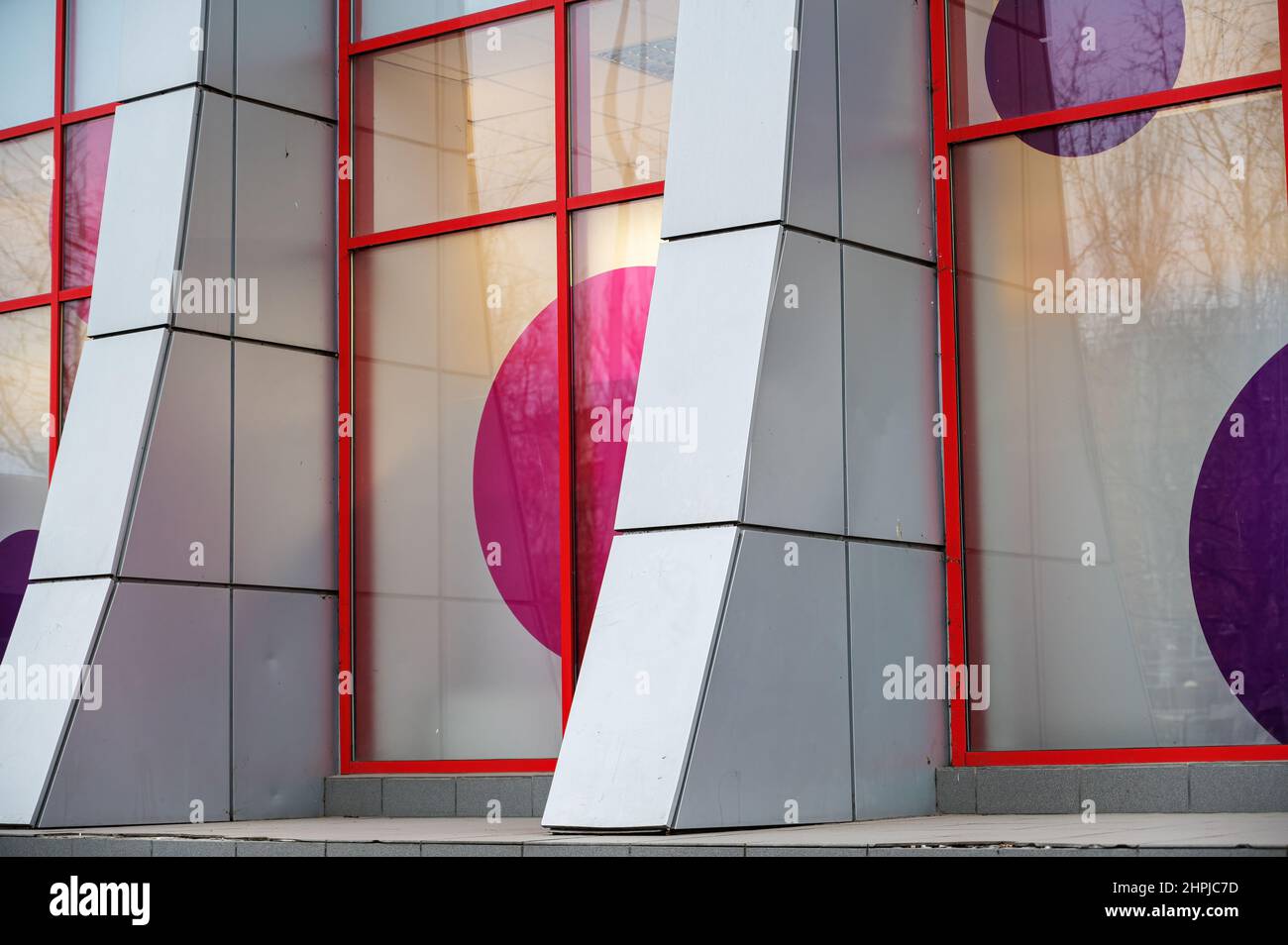 A multicolored mall window display. The architectural composition of ...