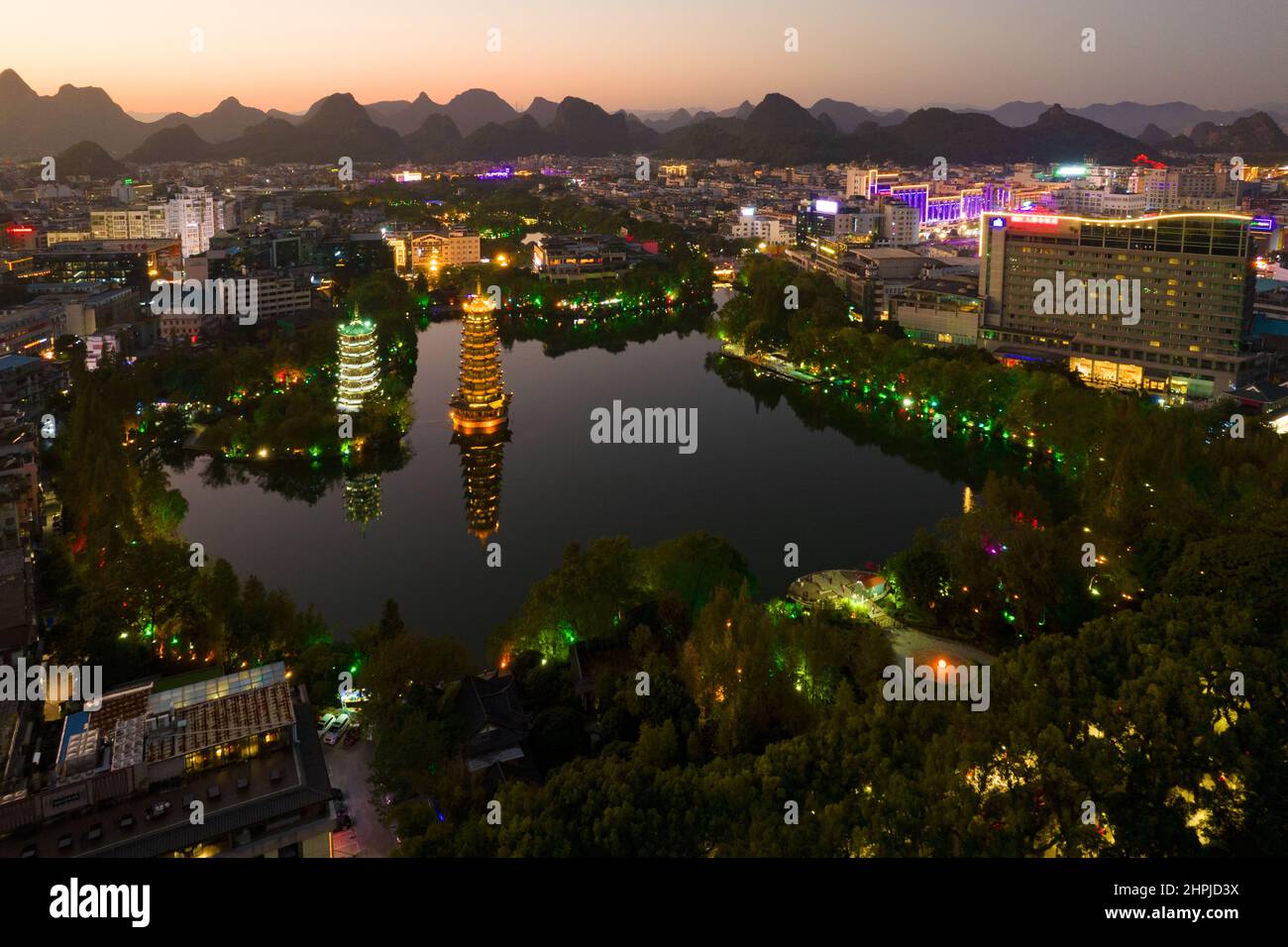 Guangxi guilin twin towers at night Stock Photo - Alamy