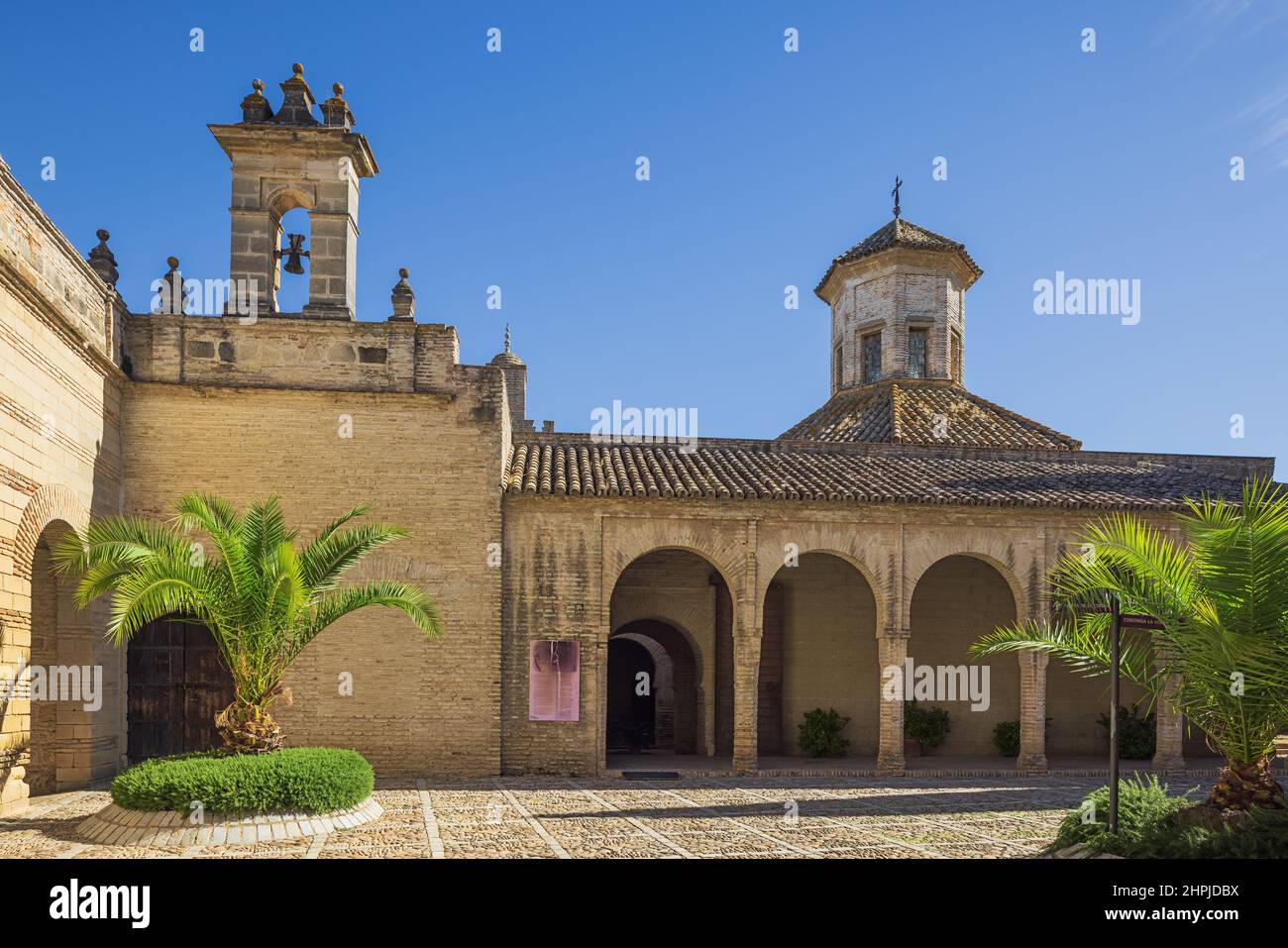 In the Courtyard of the Alcazar of Jerez de la Frontera. The signpost ...