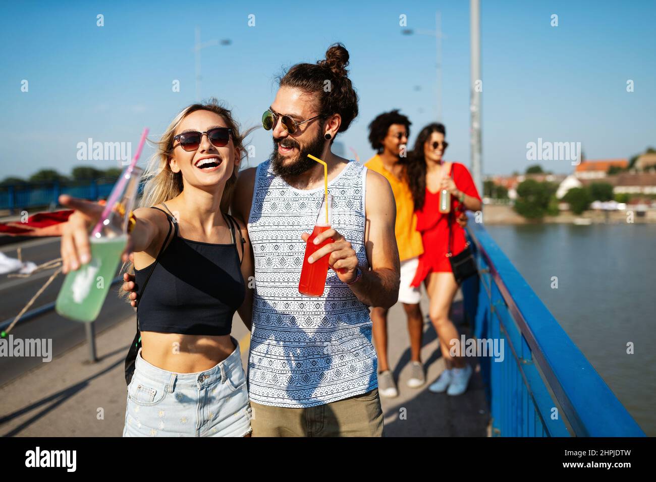 Group of happy friends people having fun together outdoors Stock Photo ...