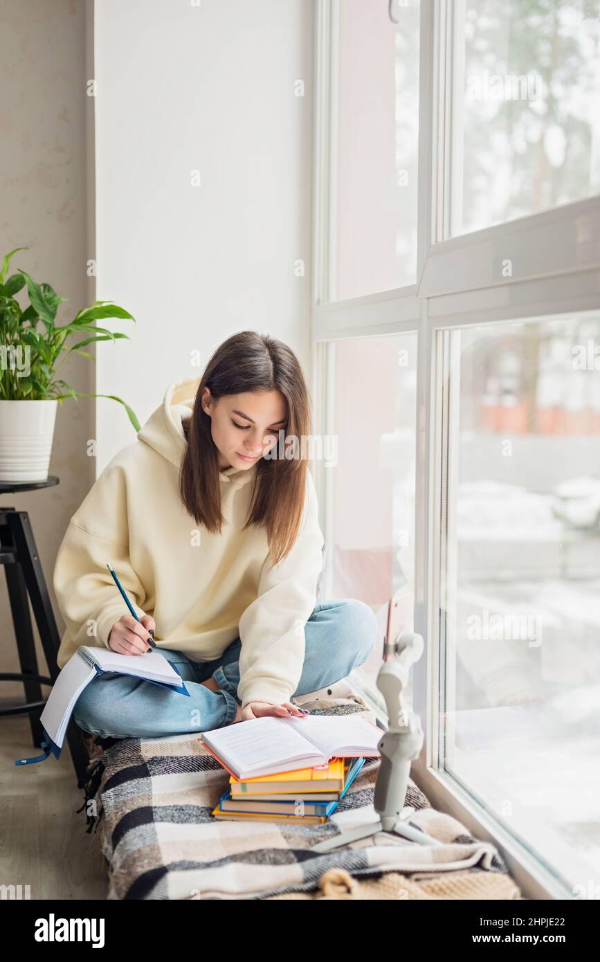 Teen school girl distant school or college student virtual remote e ...