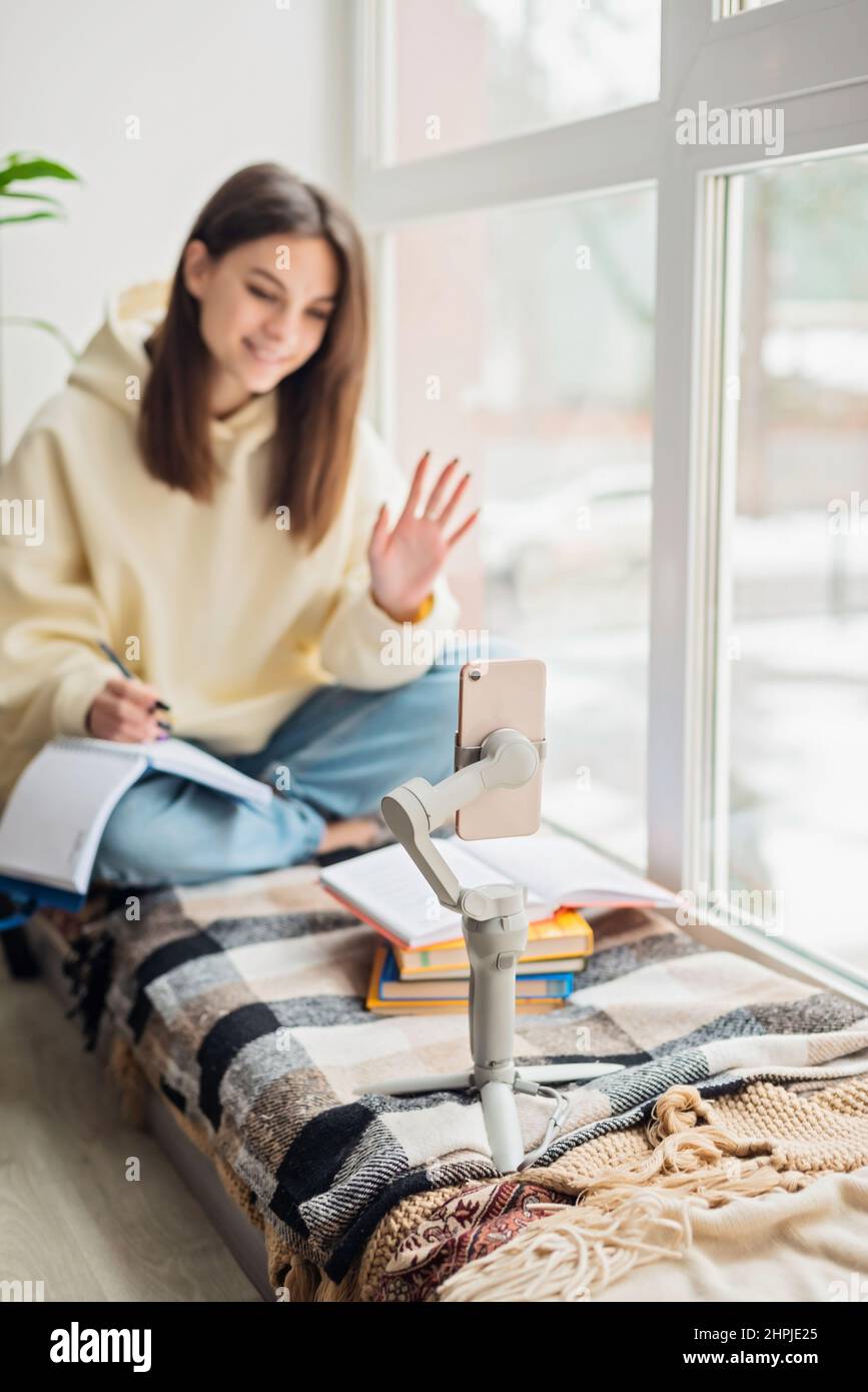 Teen school girl distant school or college student virtual remote e ...