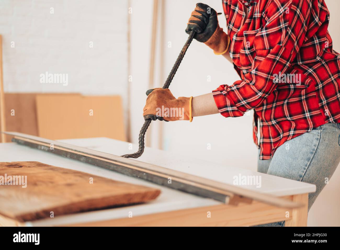 Girl with crowbar hi-res stock photography and images - Alamy