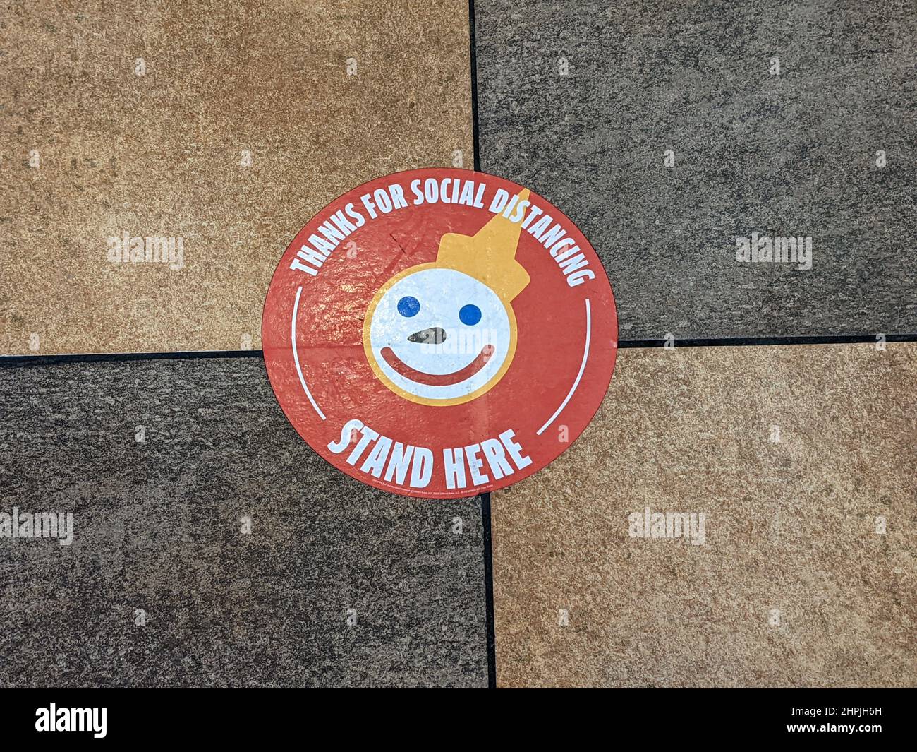 Jack in the Box "Stand Here" signage Stock Photo - Alamy