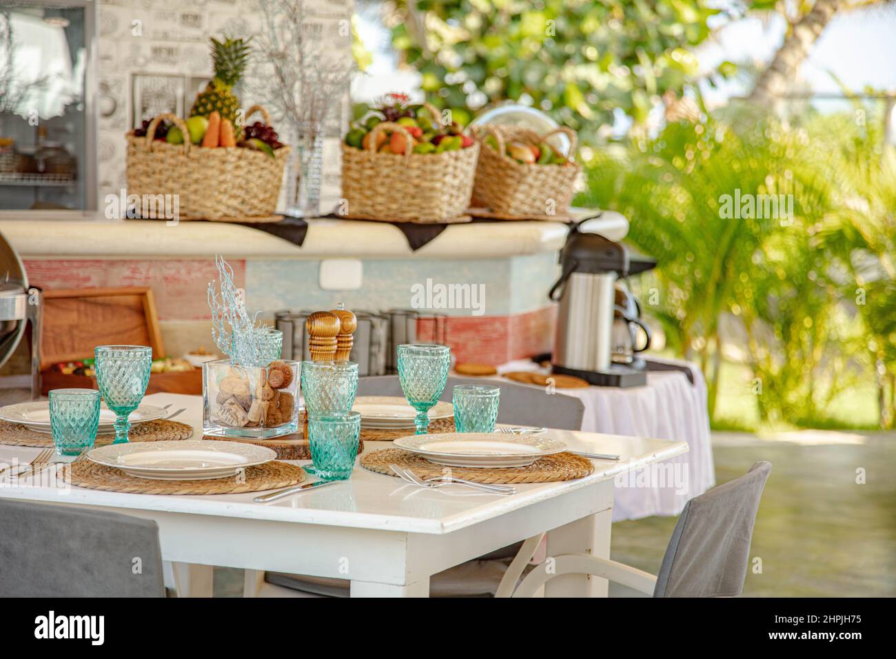 Beautiful dinner table setup outdoors Stock Photo - Alamy