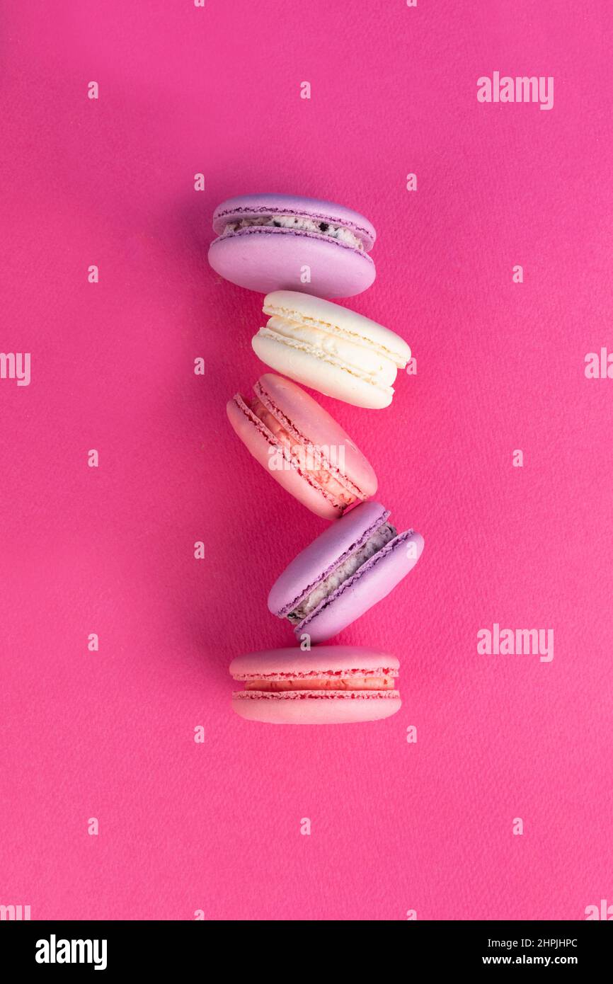 pastel sweet macarons, pink background Stock Photo - Alamy
