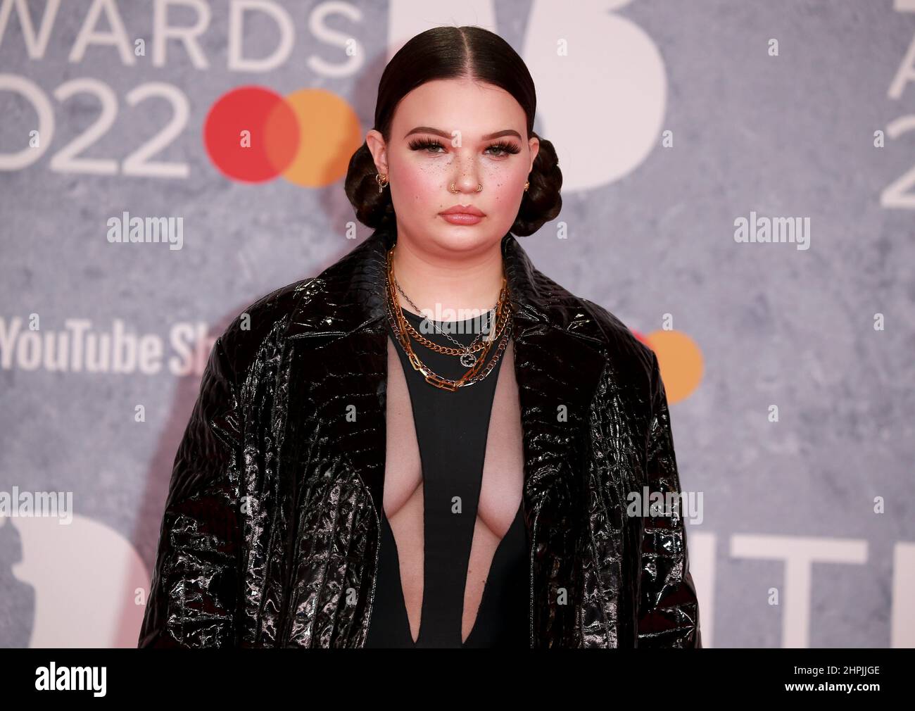 Lola Young arrives at The BRIT Awards 2022 at The O2 Arena on February ...