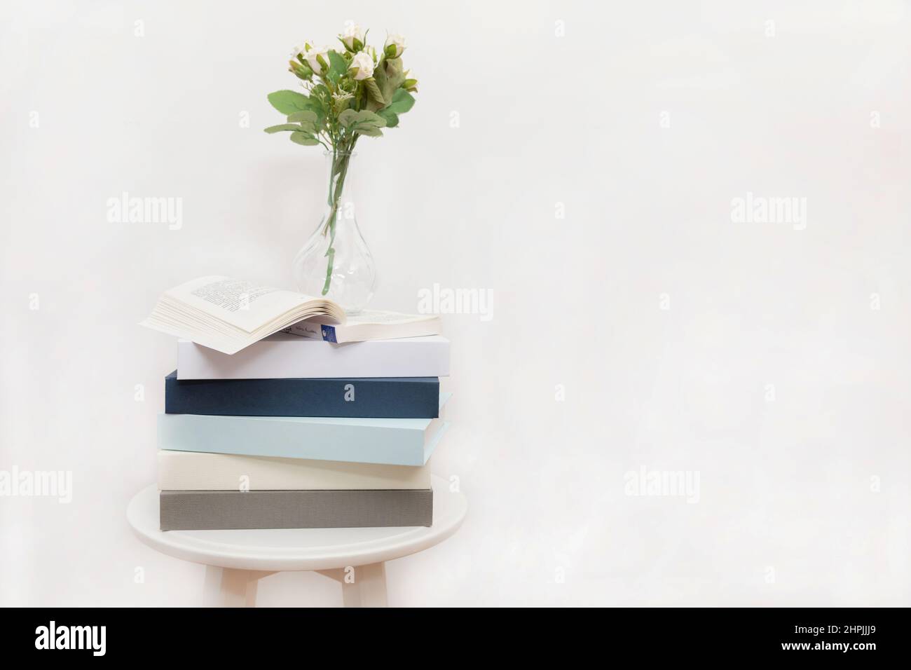relax cozy objects and background with glasses, a book, flower pot ...