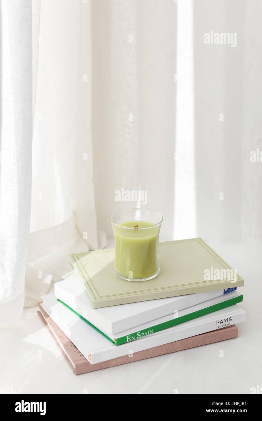 relax cozy objects and background with a book, candle Stock Photo - Alamy