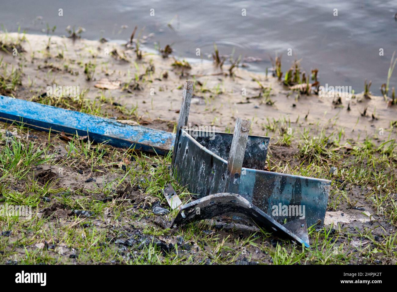 Used and discarded in nature broken disposable brazier Stock Photo - Alamy