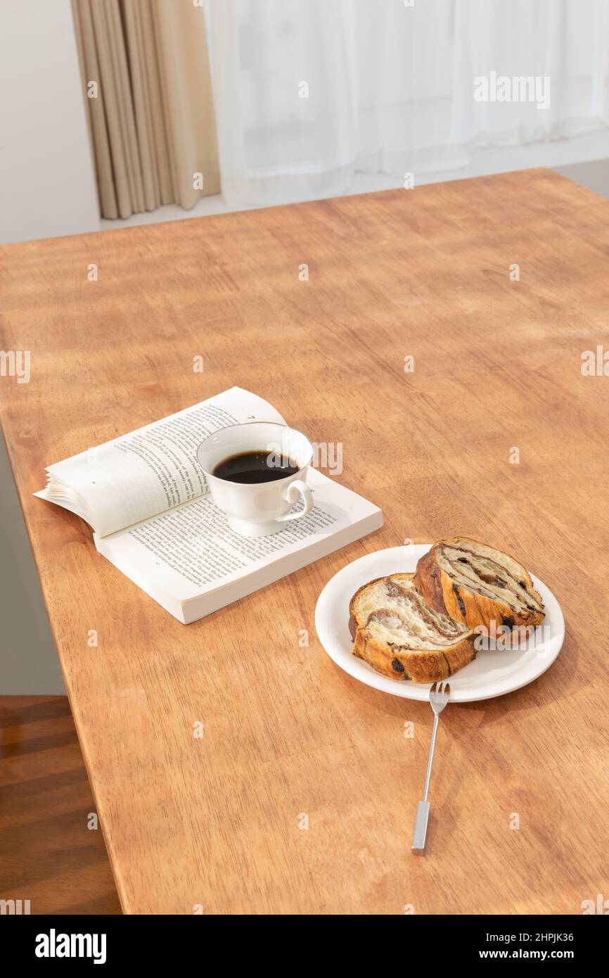 relax cozy objects and background with coffee, bread, a book Stock ...
