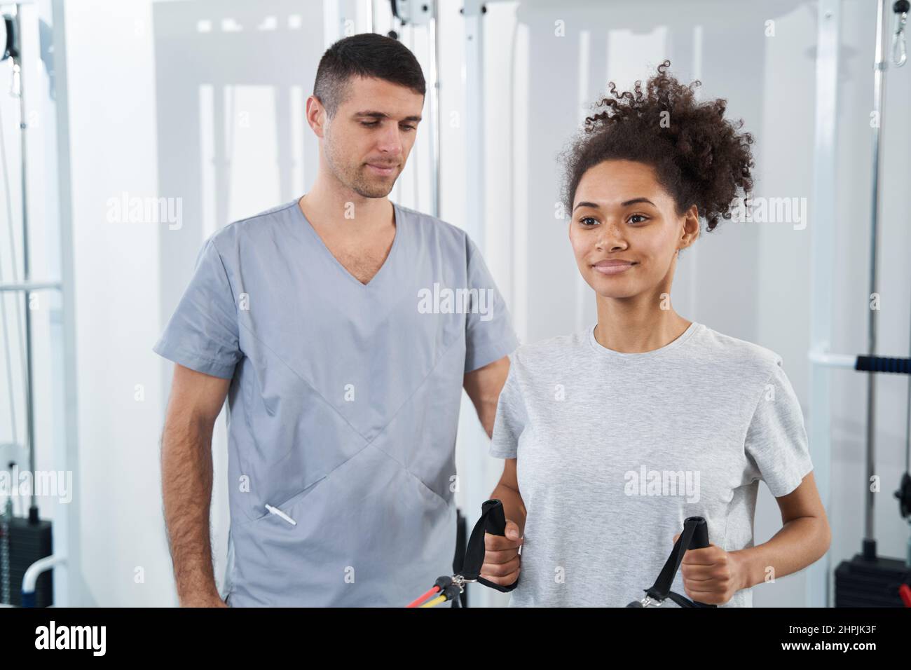 African female actively training in the gym Stock Photo - Alamy