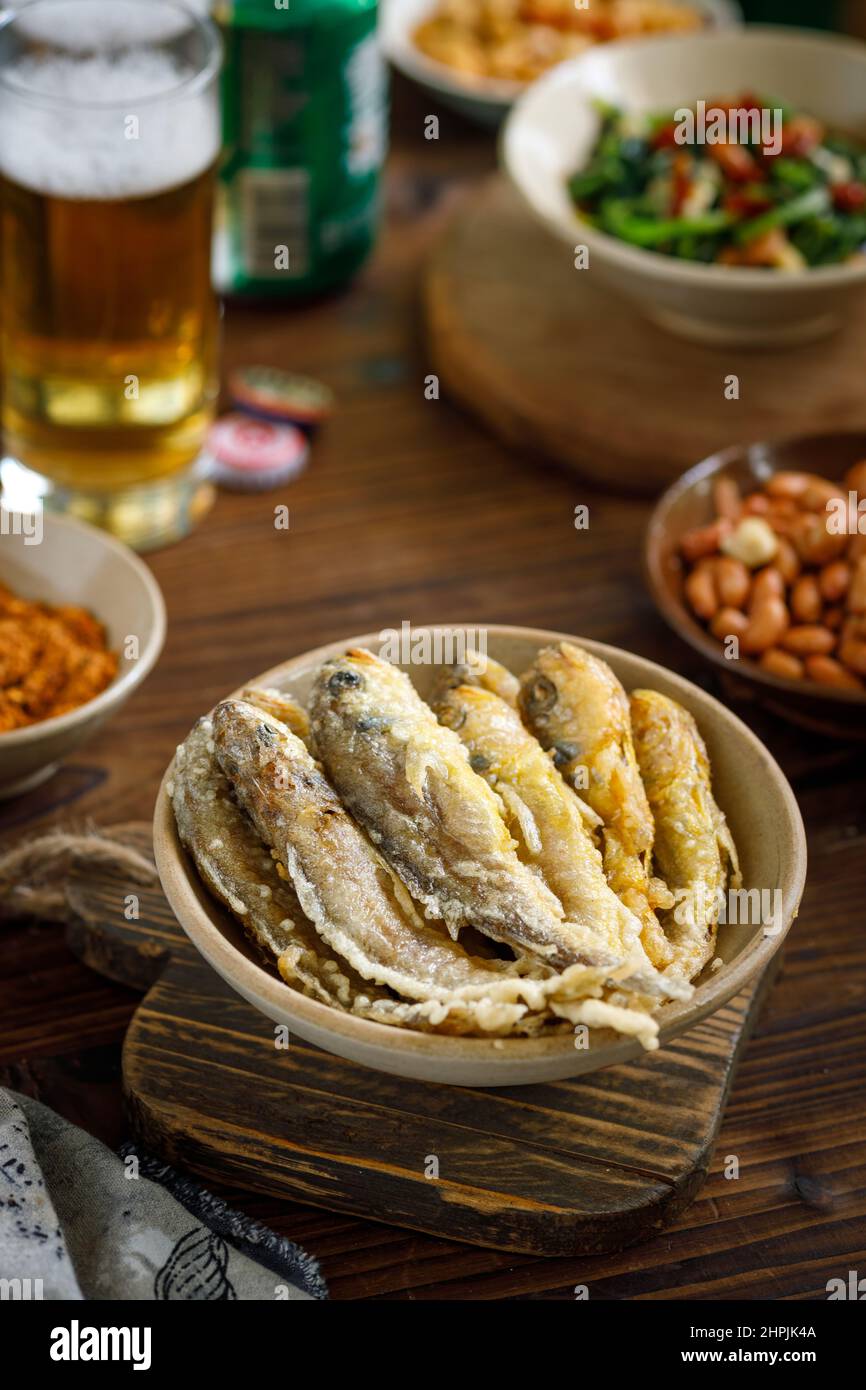 Crispy Fried small yellow croaker Stock Photo - Alamy