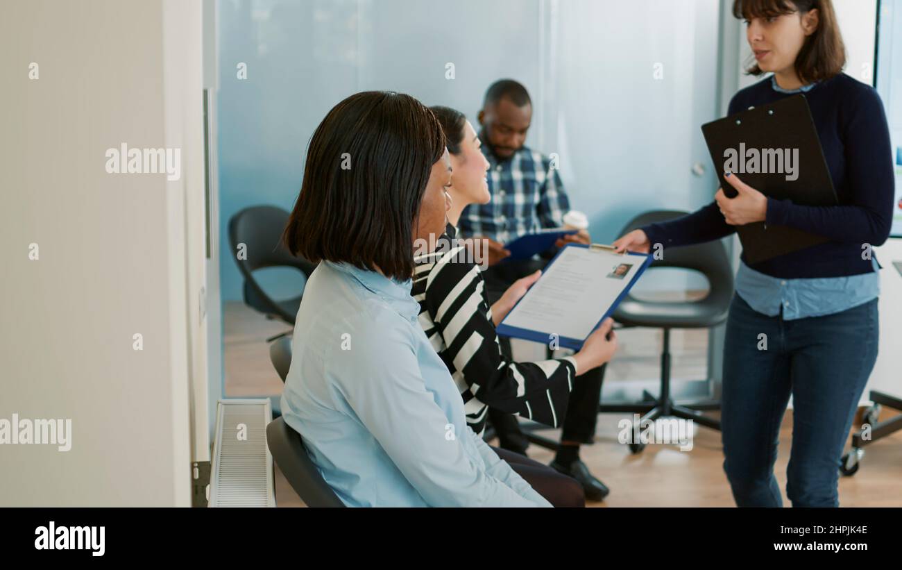 Recruitment applicant receiving cv papers hi-res stock photography and ...