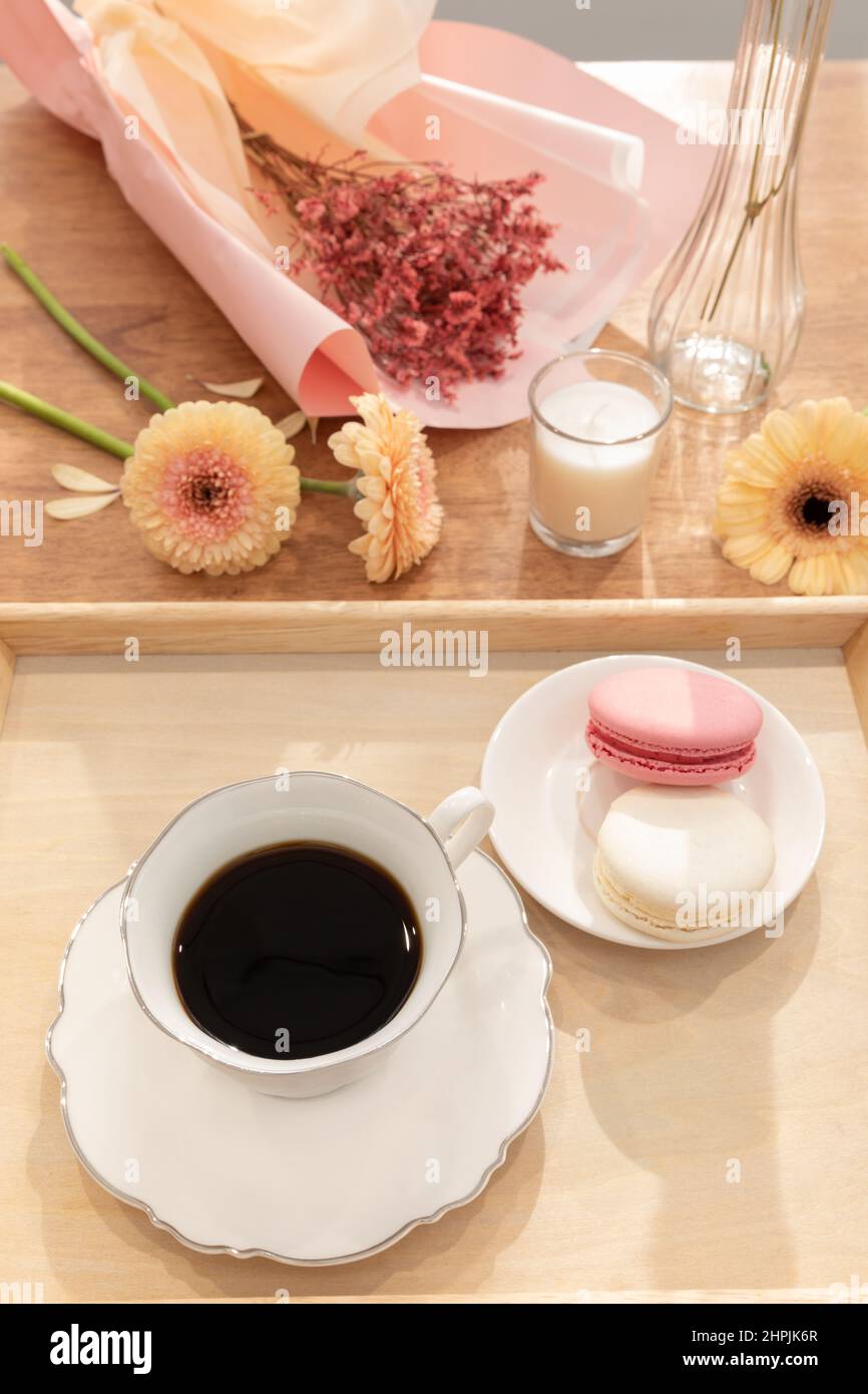 relax cozy objects and background with coffee, macaron, candle, vase ...