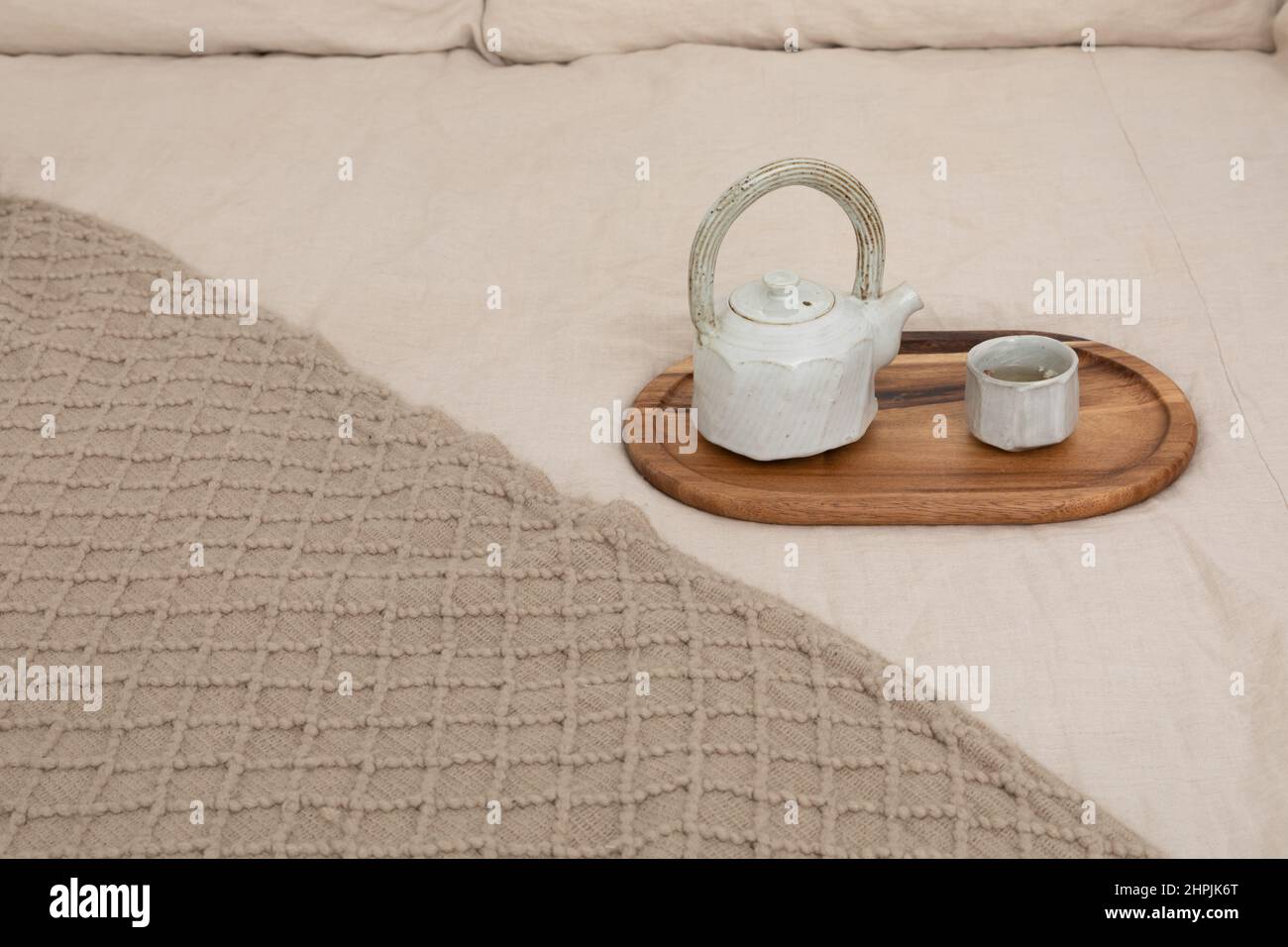 relax cozy objects and background with teapot, tea cup, bedding Stock ...