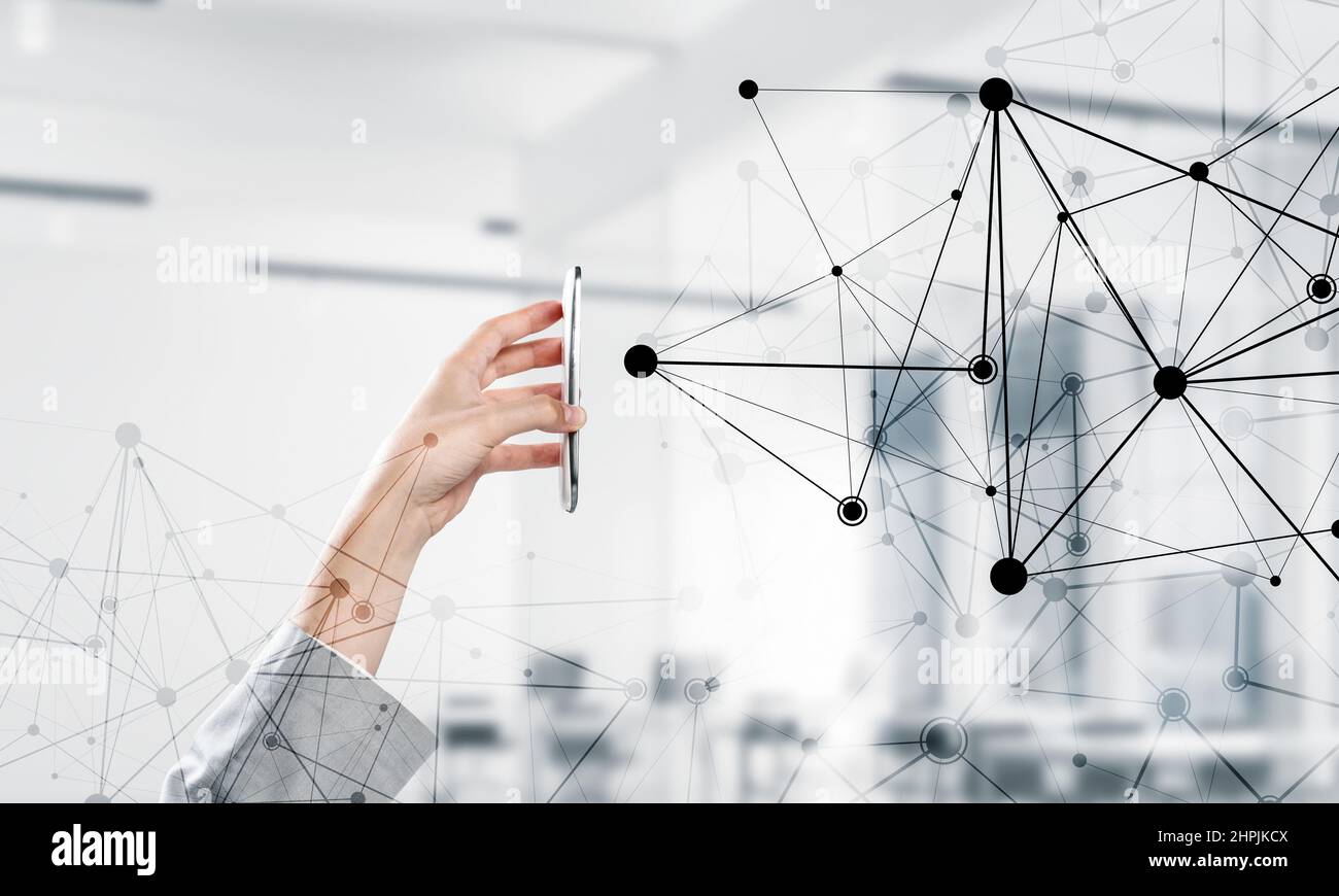 Business and technology concept with networking grid and man using ...