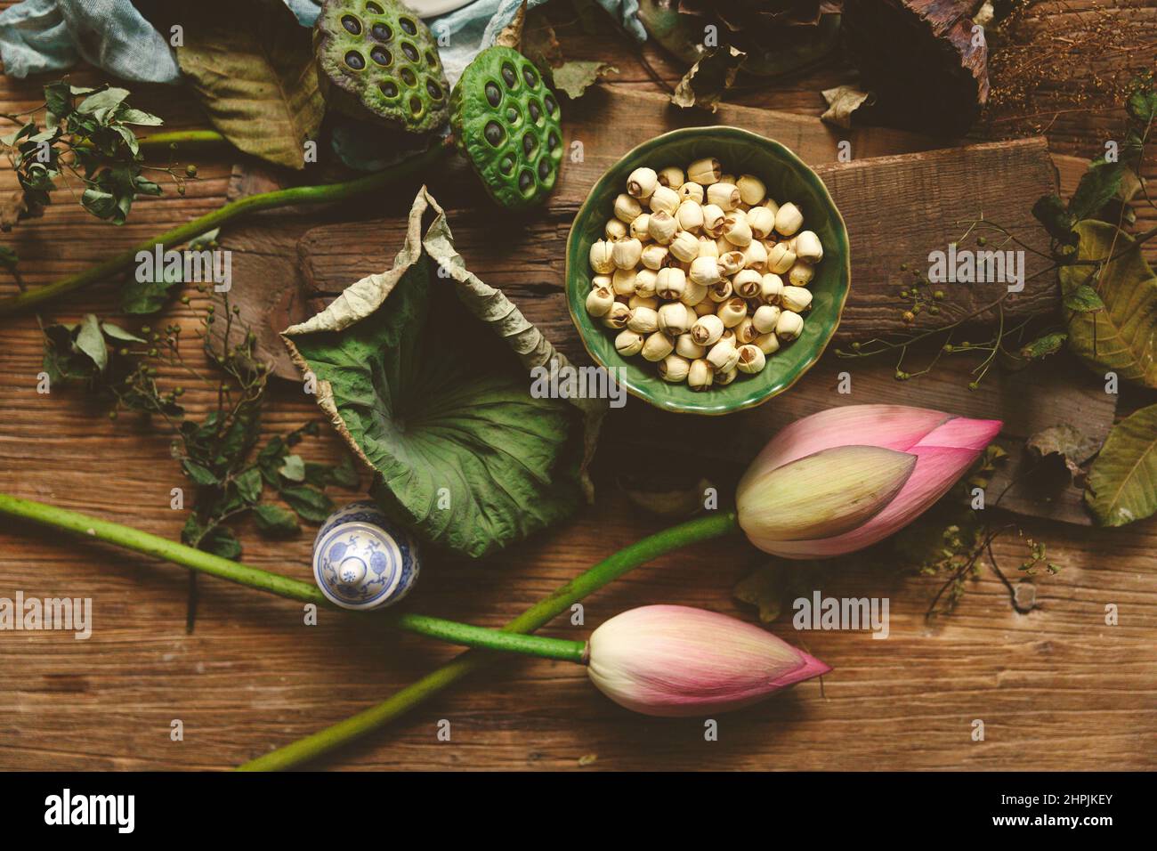 Lotus stem harvesting hi-res stock photography and images - Alamy