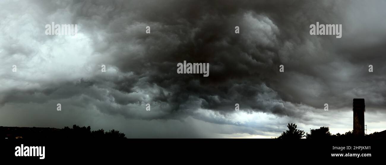 Danger storm clouds covering the sky with dark clouds.Ominous storm ...