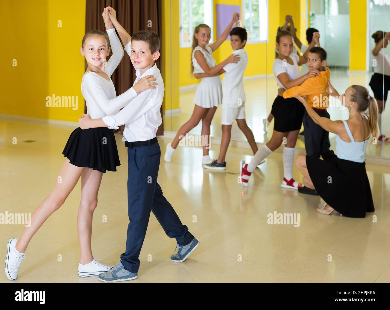Children dancing pair dance in class Stock Photo - Alamy