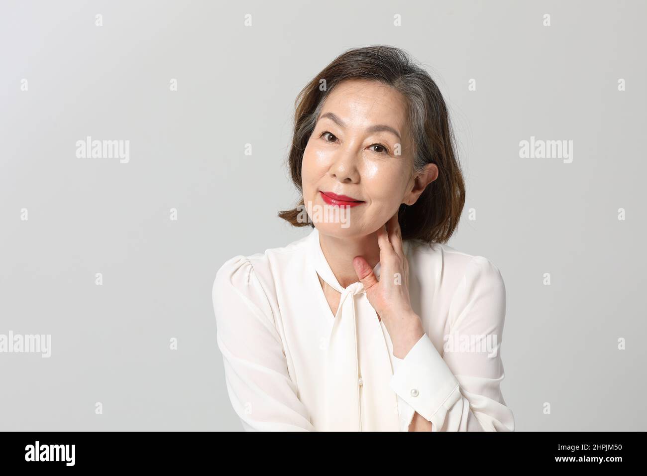 Asian Korean senior woman, basic skin care beauty concept in studio ...